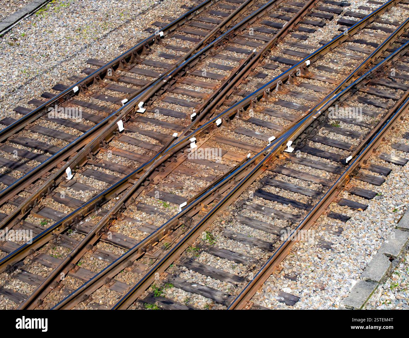 The intersection of several tracks at a railway station Stock Photo - Alamy