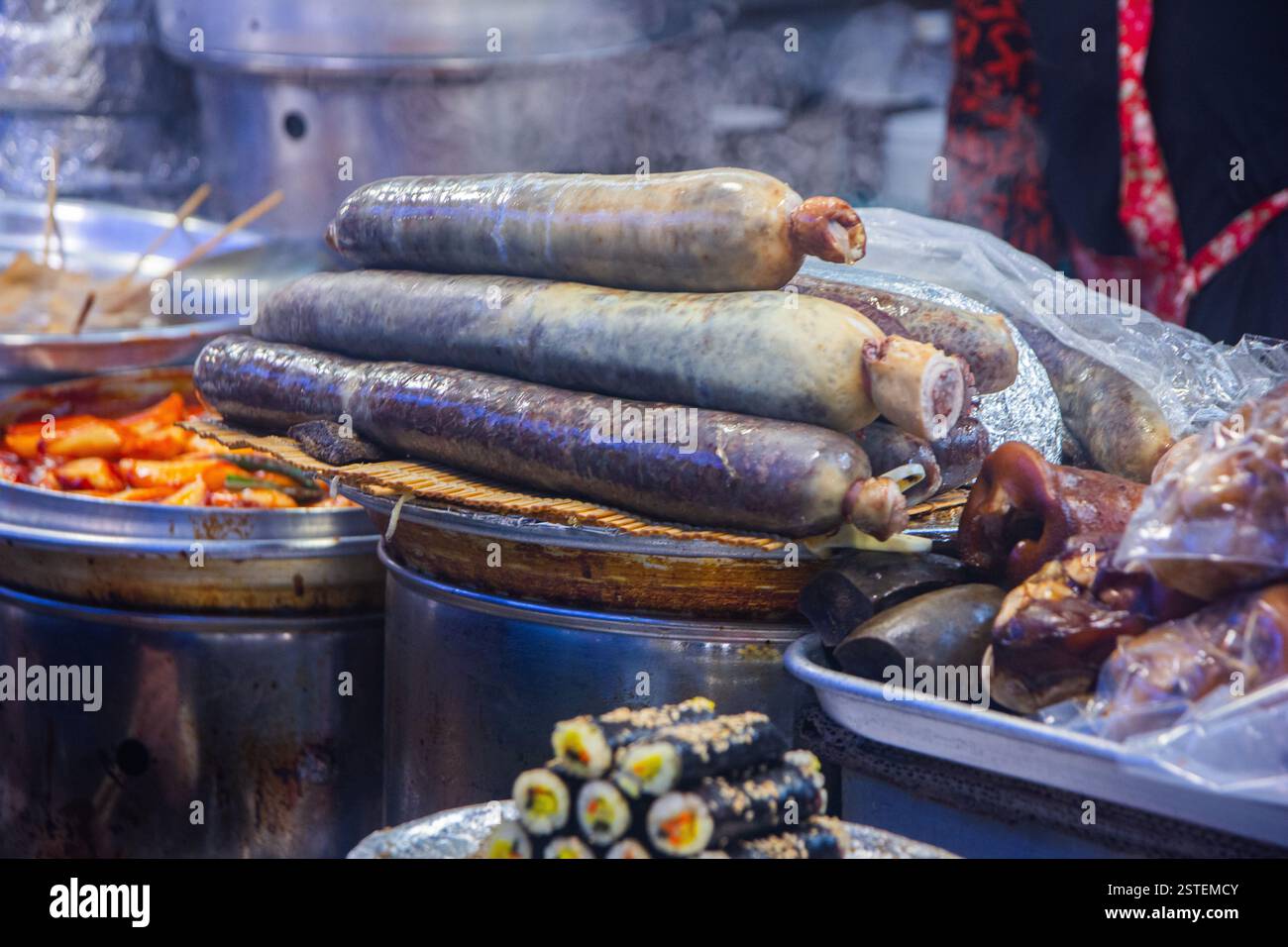Korean traditional street food stall with kimbap, sundae (Korean blood sausage) at Gwangjang ...