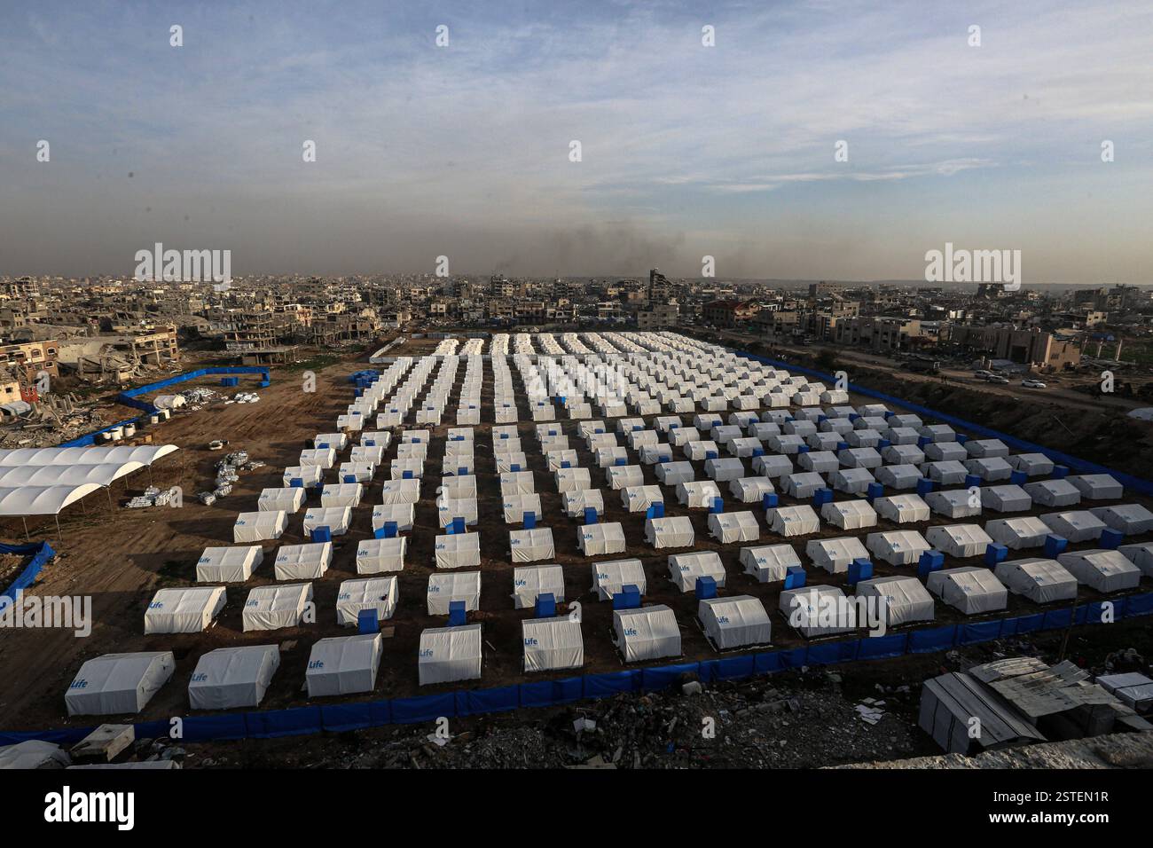 Newly erected tents are spread in Al-Zeitoun neighbourhood in Gaza City ...