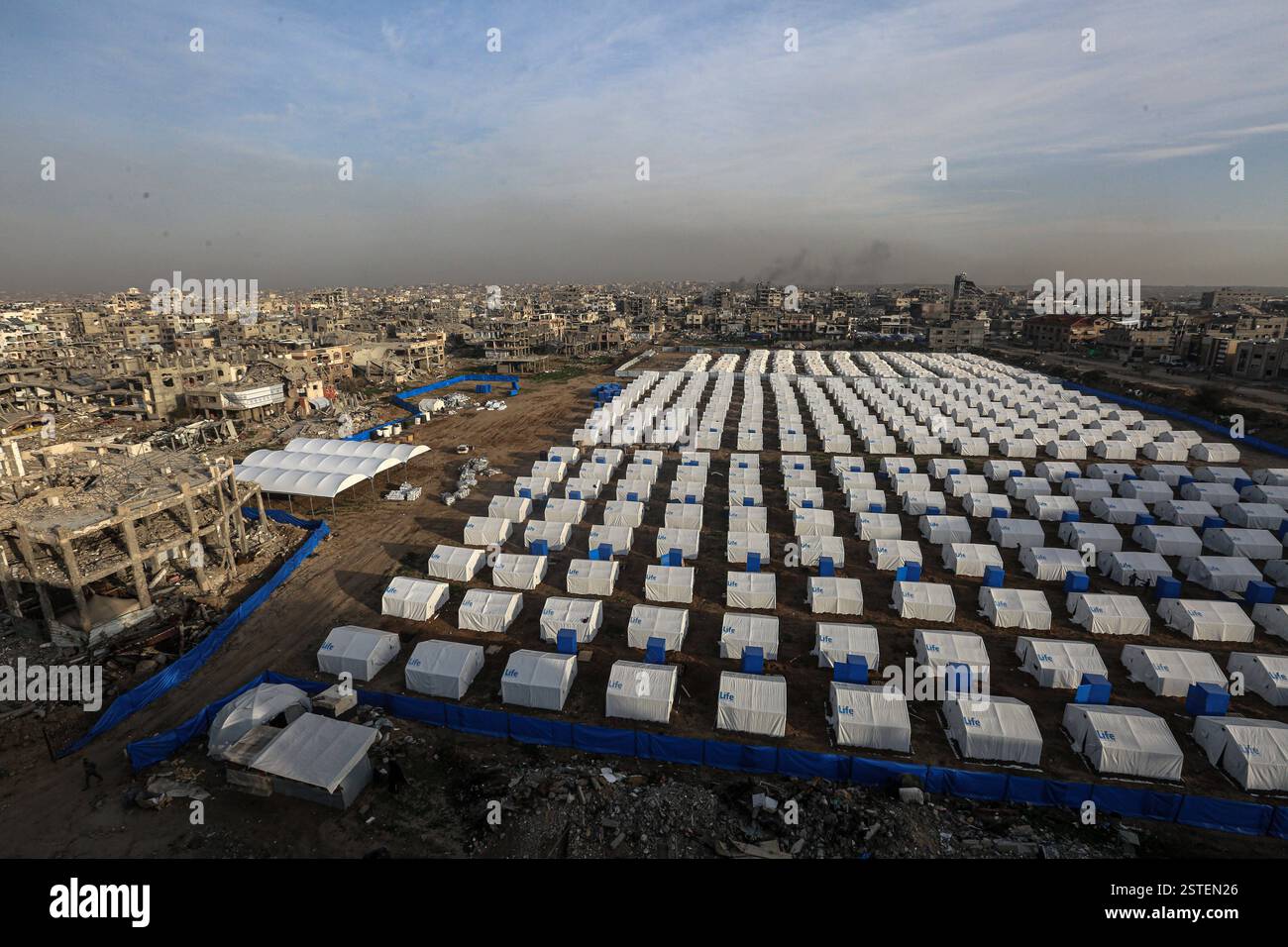 Newly erected tents are spread in Al-Zeitoun neighbourhood in Gaza City ...