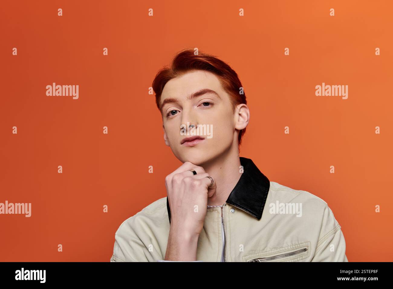 A young man with striking features showcases a range of emotions ...