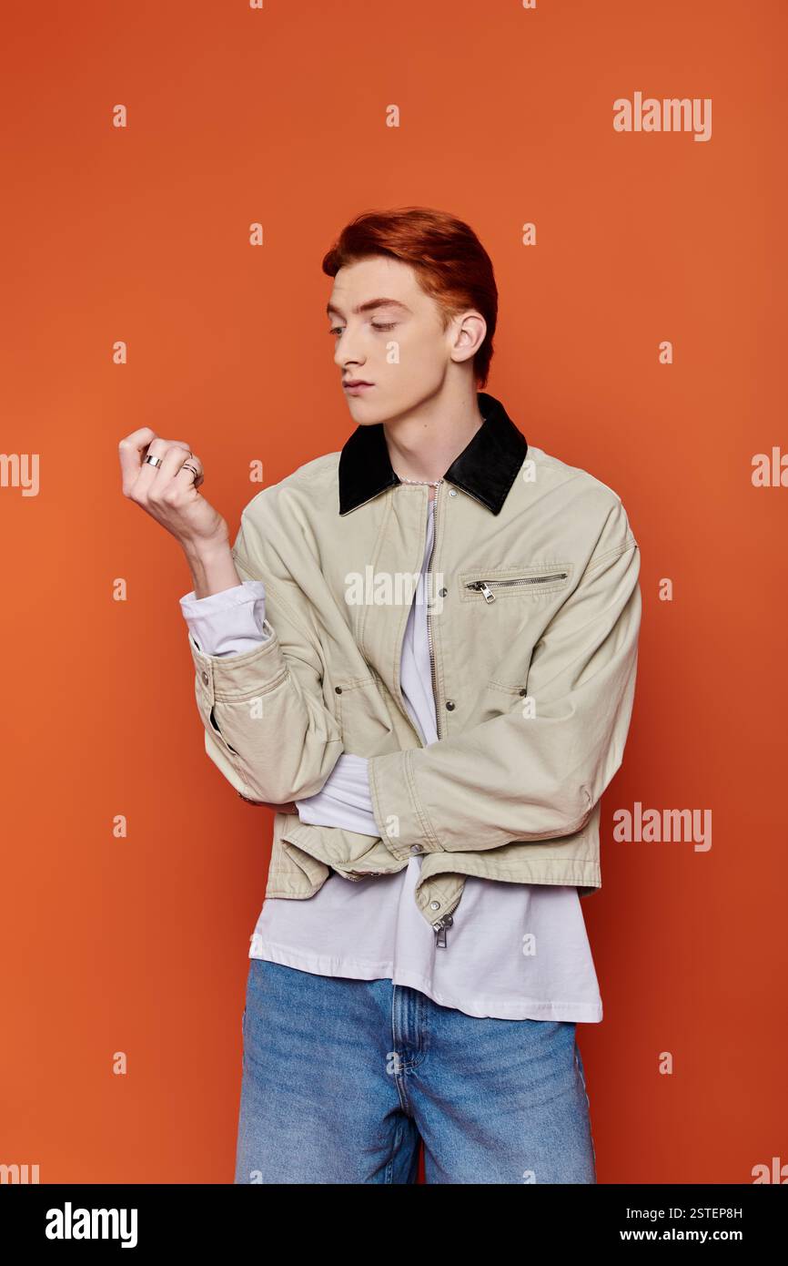 A handsome young man poses confidently, expressing deep emotion against ...