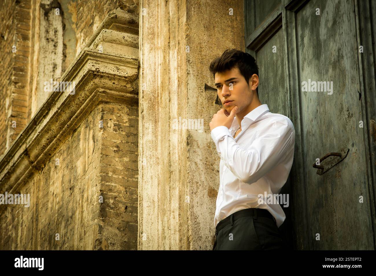 Man leaning against door hi-res stock photography and images - Alamy