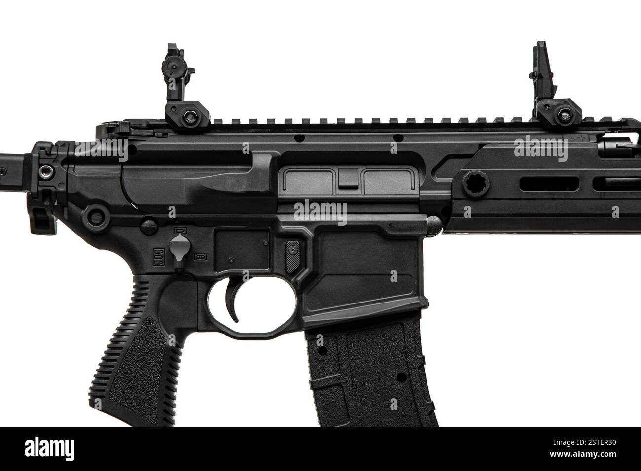 A close-up of a black airsoft replica of an automatic AR-style carbine ...