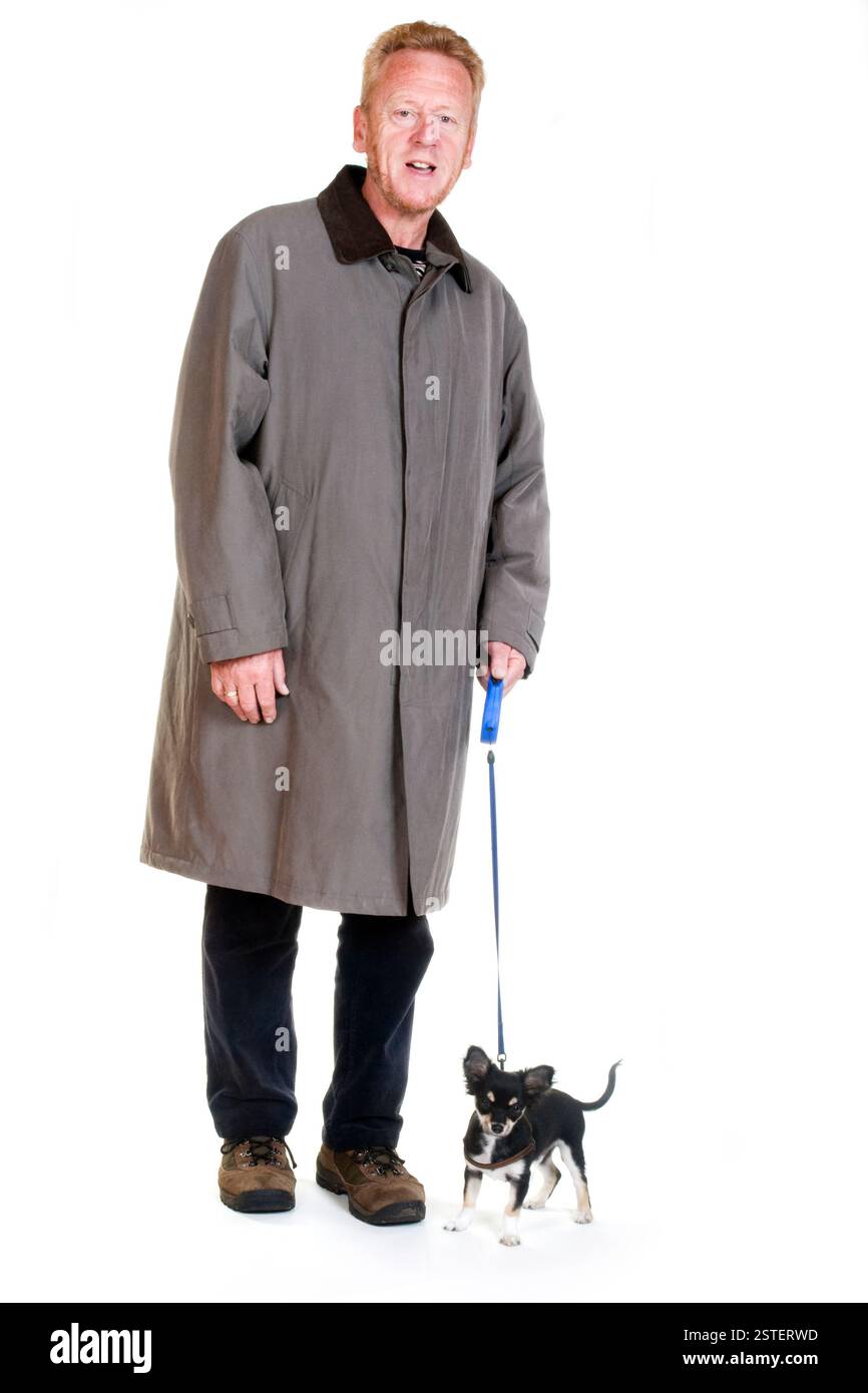 Man and dog and walking Cut Out Stock Images & Pictures - Alamy