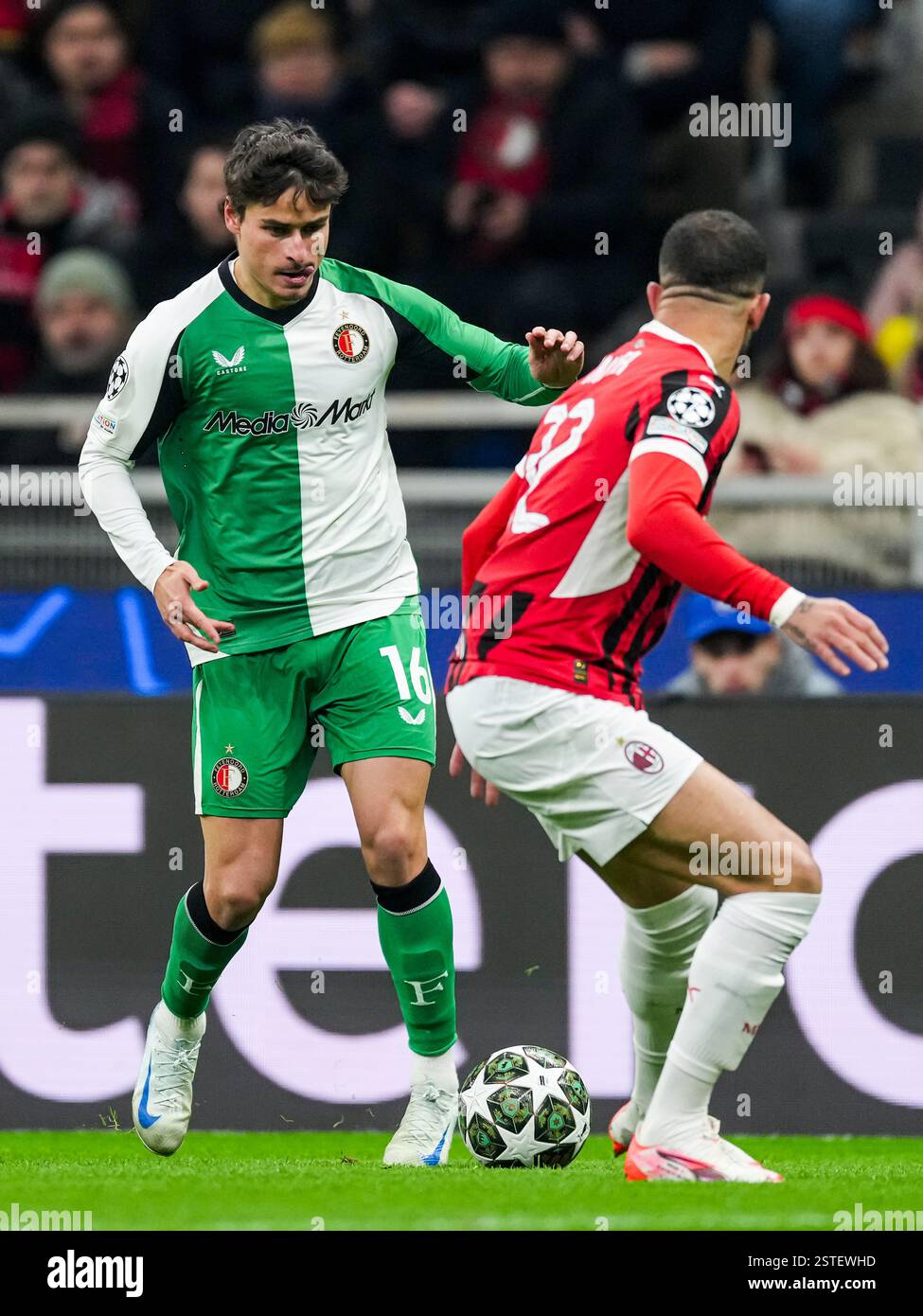 Milan, Italy. 18th Feb, 2025. Milan - Hugo Bueno of Feyenoord, Kyle ...