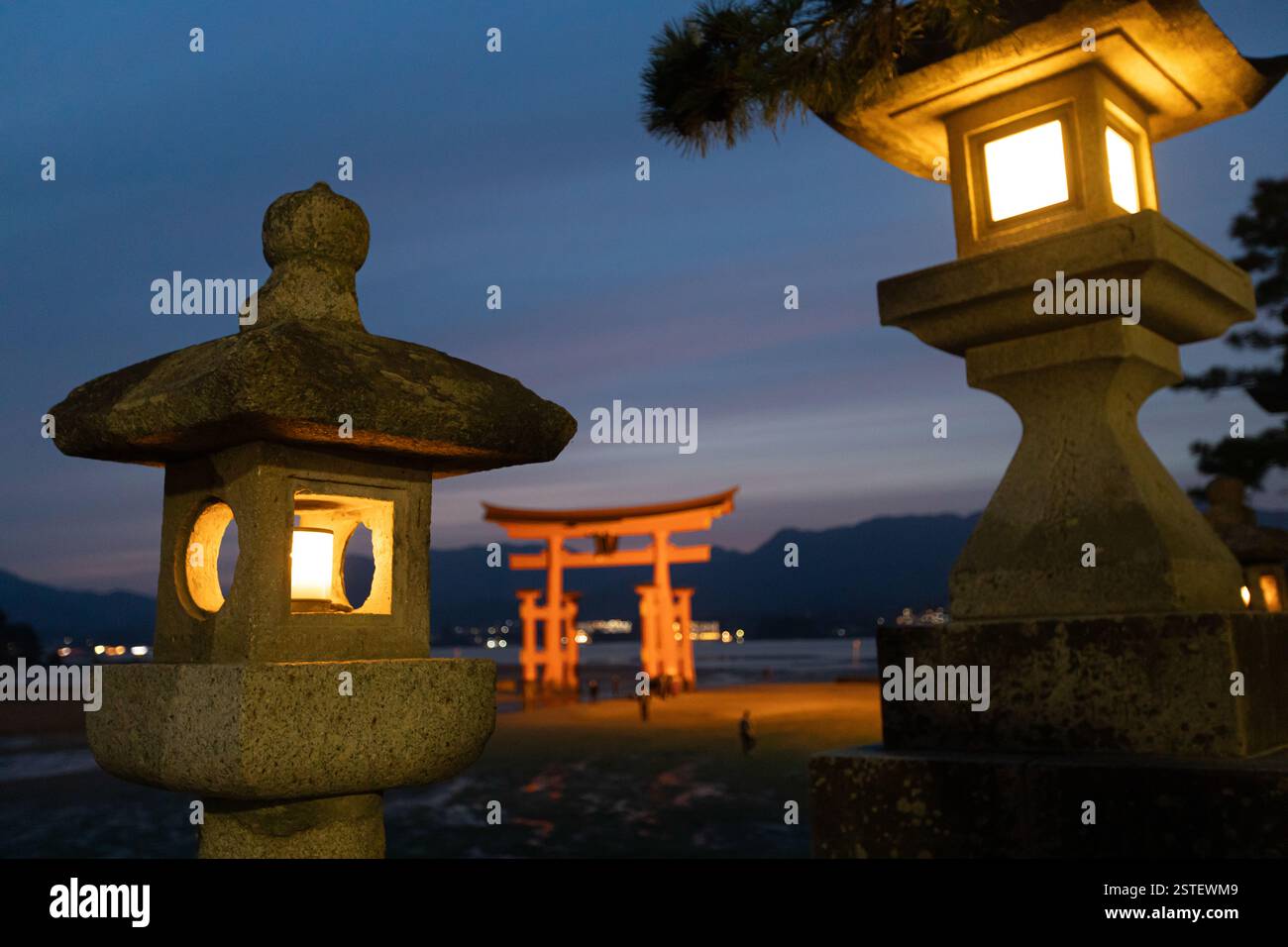 Itsukushima, Hiroshima, Japan - 30-3-2024: Miyajima torii gate at night ...