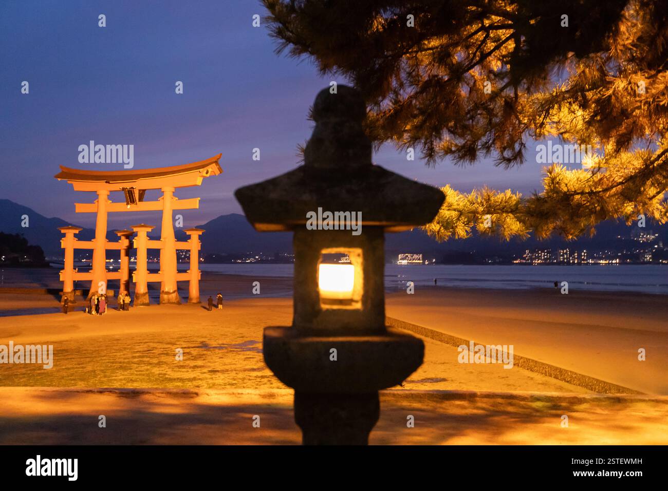 Itsukushima, Hiroshima, Japan - 30-3-2024: Miyajima torii gate at night ...