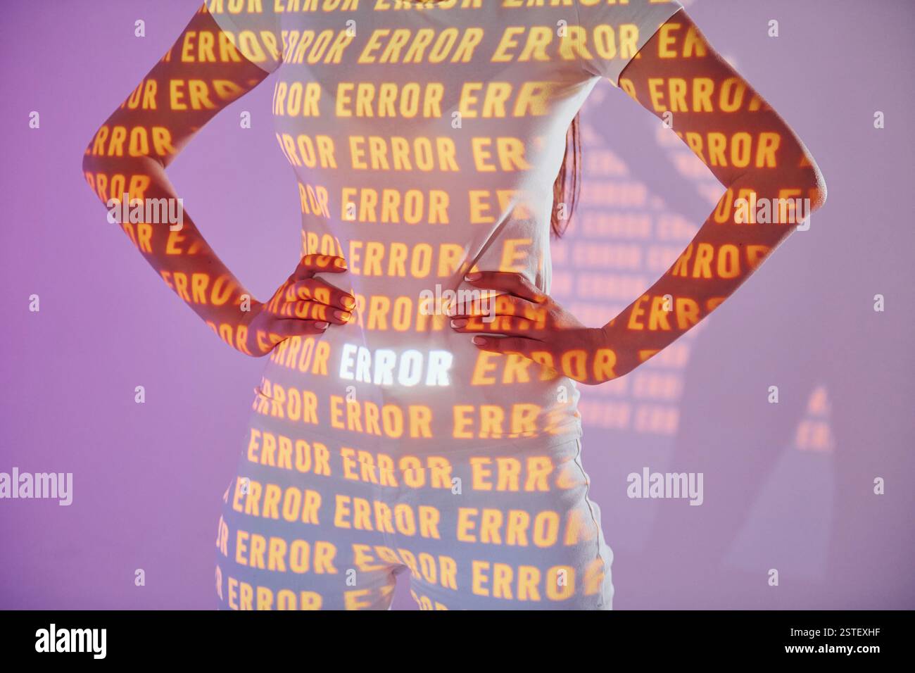 Error, word. Beautiful young woman is in projector neon lights in the ...