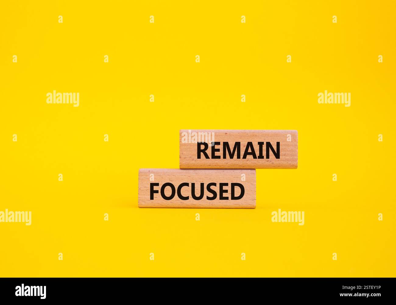 Remain focused symbol. Concept words Remain focused on wooden blocks ...