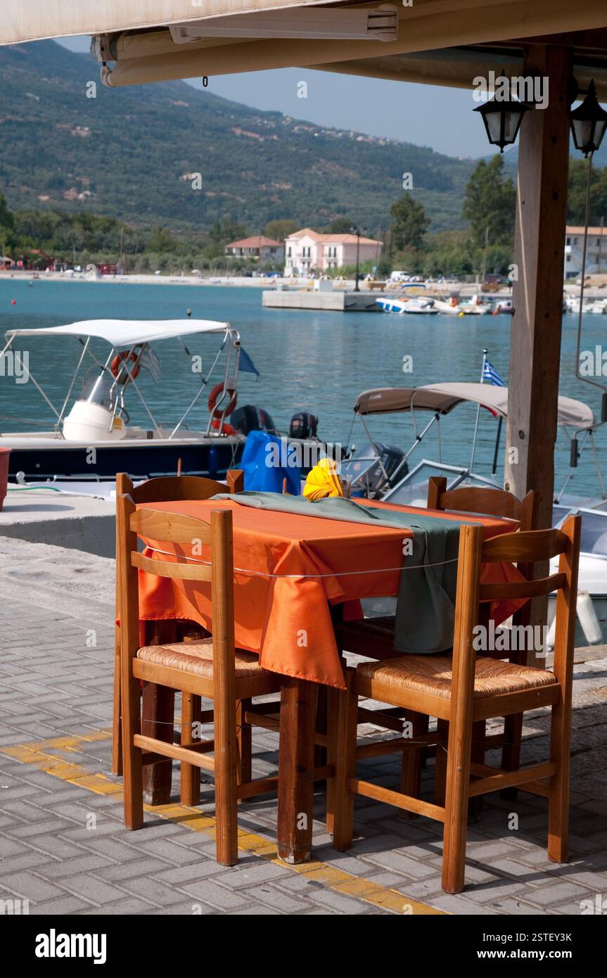 Terrace in the Greek harbor Stock Photo - Alamy