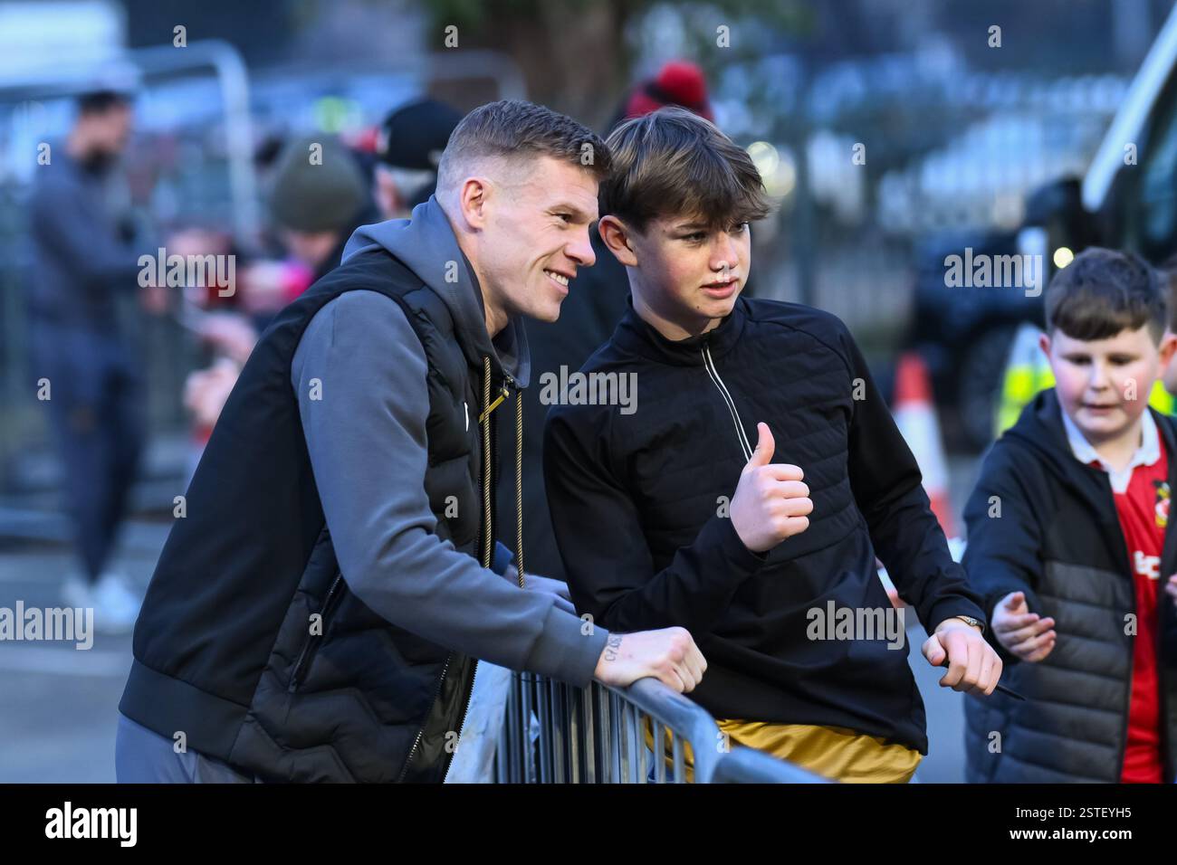 James McClean of Wrexham has a selfie with fans as he arrives ahead of ...