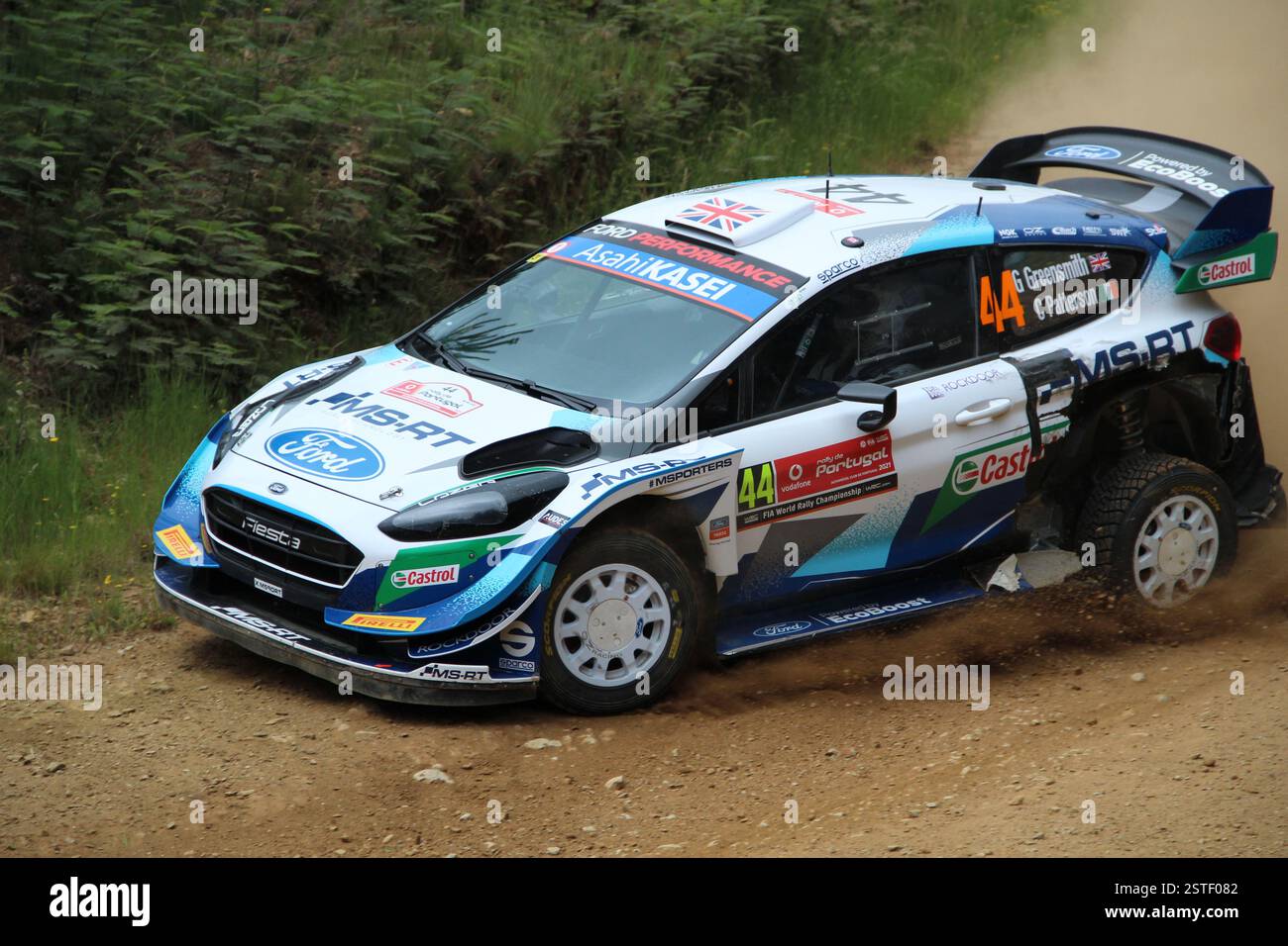 Ford rally car of Gus Greensmith captured drifting through a tight ...