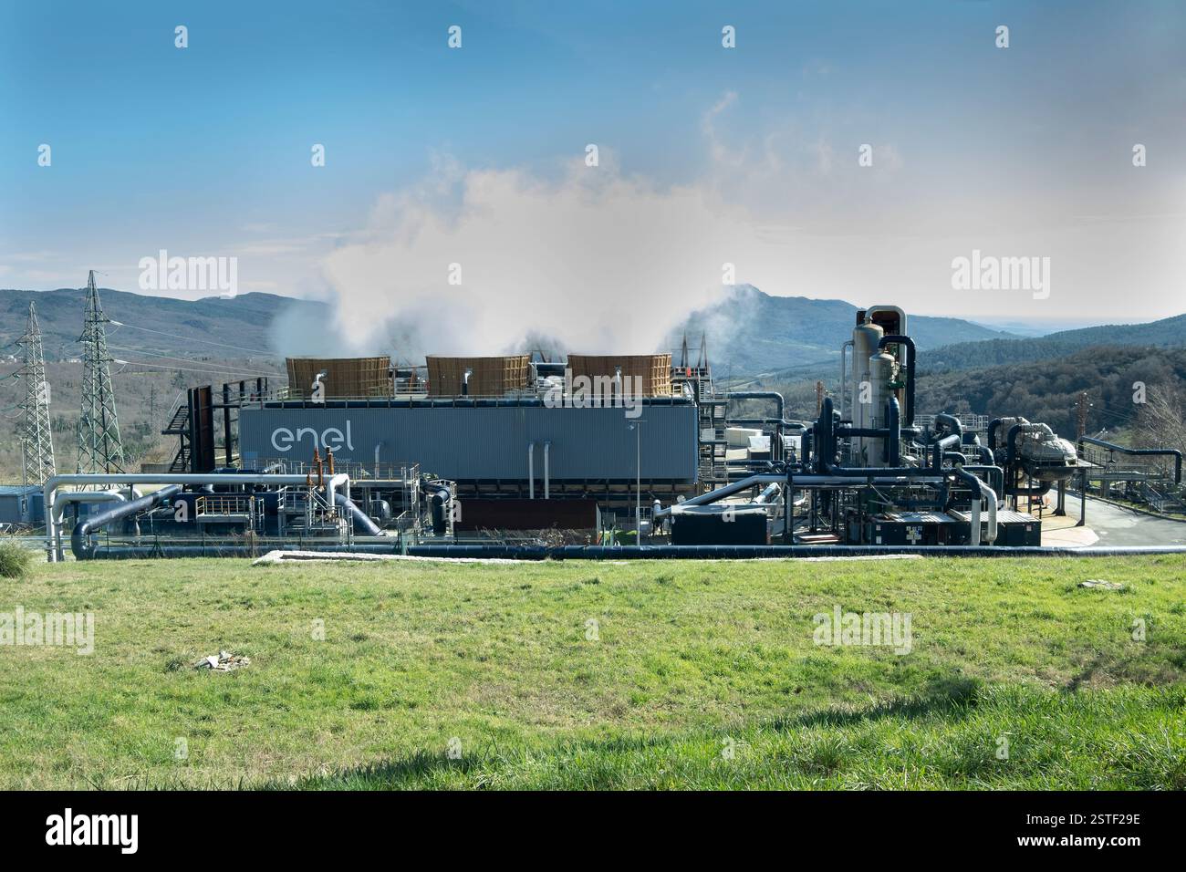 Geothermal power plant Enelgreen power Bagnore releasing steam into the ...