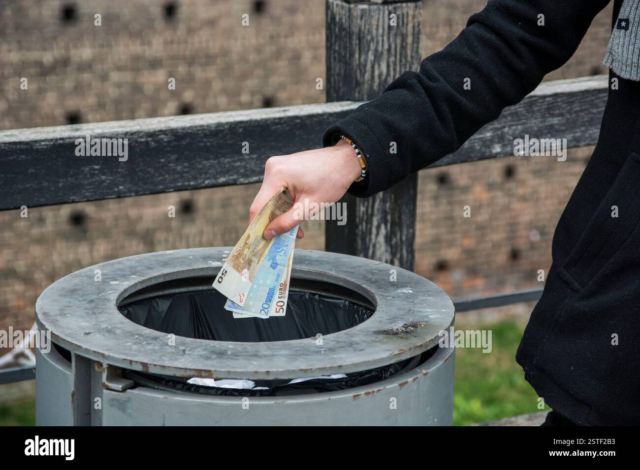 Throwing trash in can hi-res stock photography and images - Alamy