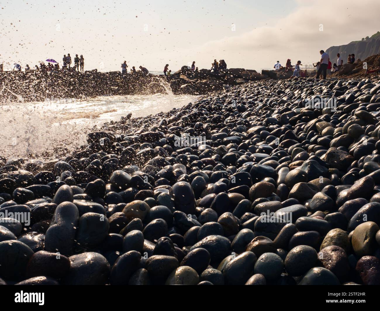 Ocean waves on a rocky beach in Lima. Playa Waikiki, Miraflores, Lima ...