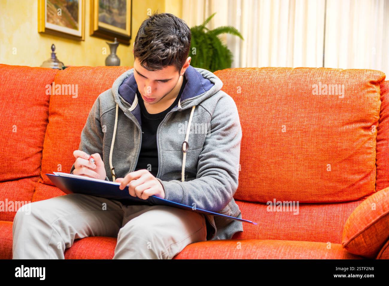 Happy casual man writing hi-res stock photography and images - Alamy