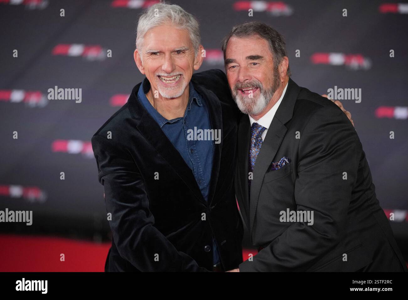 Former F1 drivers Nigel Mansell, right, and Demon Hill pose for the ...