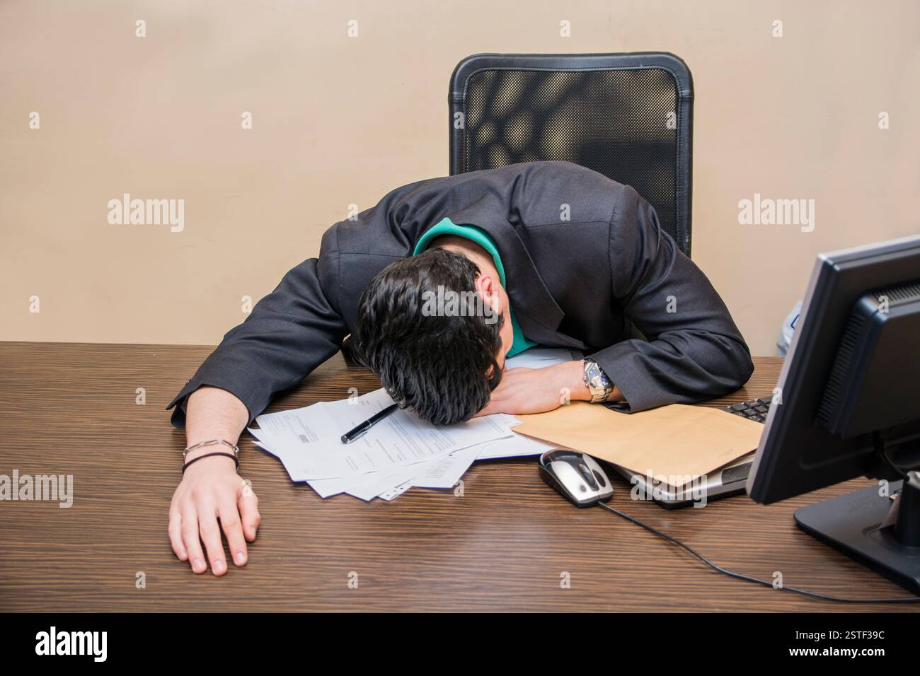 Tired businessman table in hi-res stock photography and images - Alamy