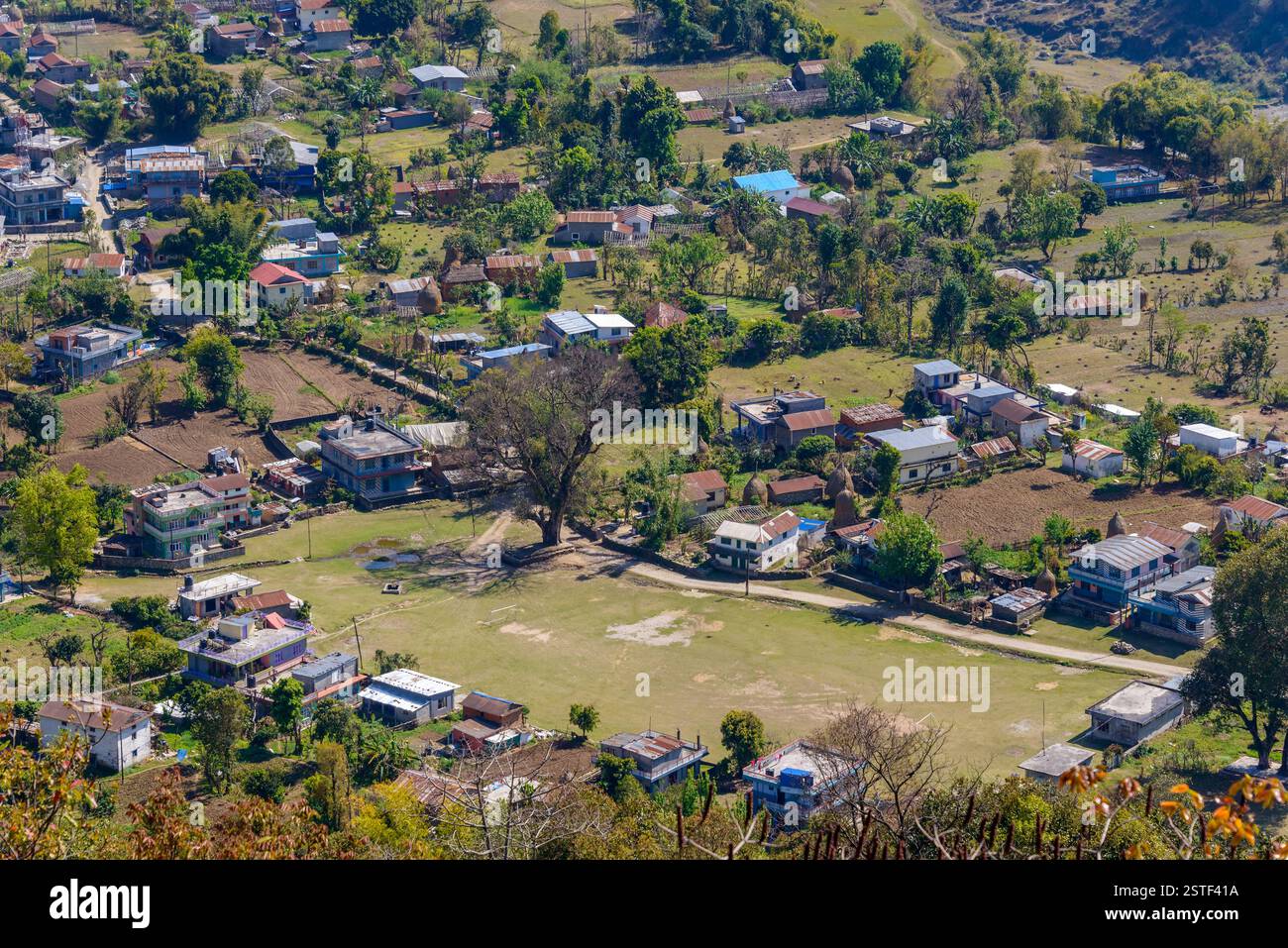 Green foliage over village hi-res stock photography and images - Alamy