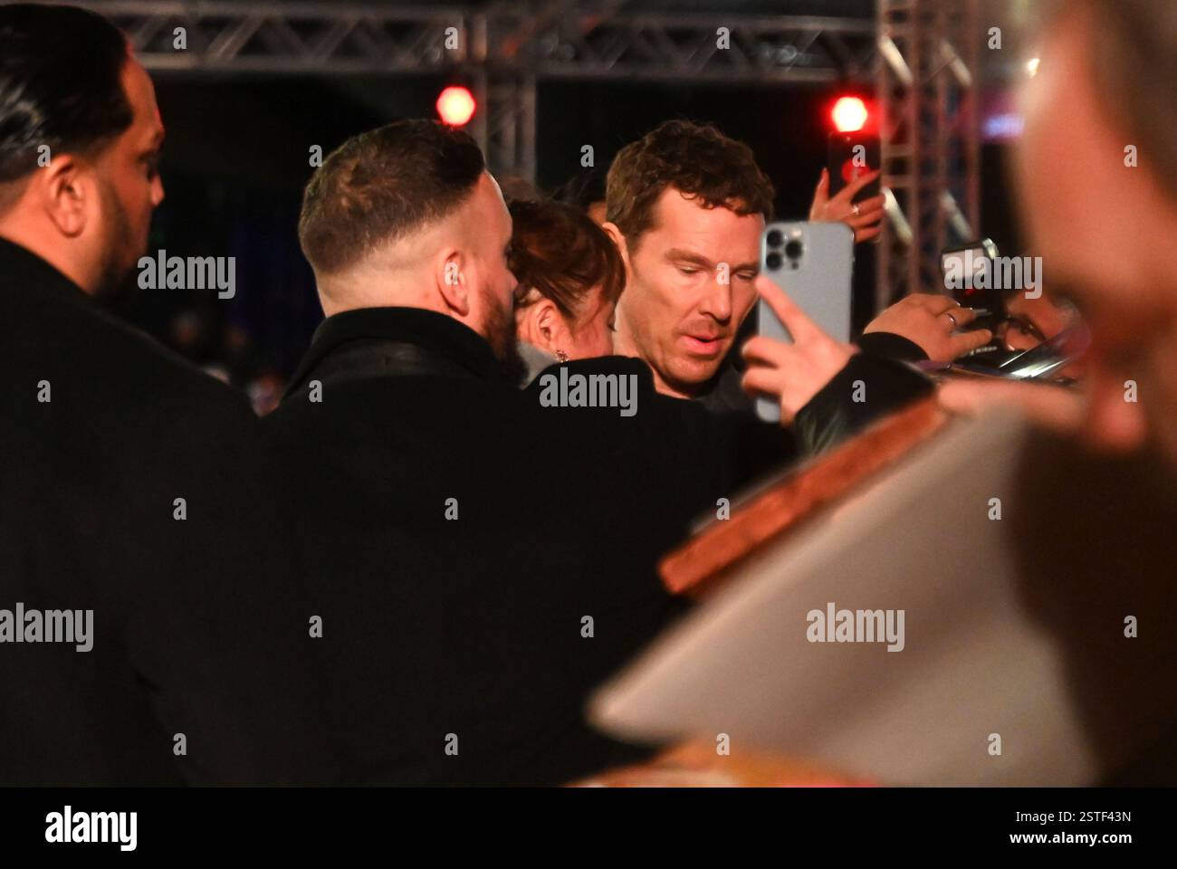 Berlin, Germany. 18th Feb, 2025. Benedict Cumberbatch stands on the red ...