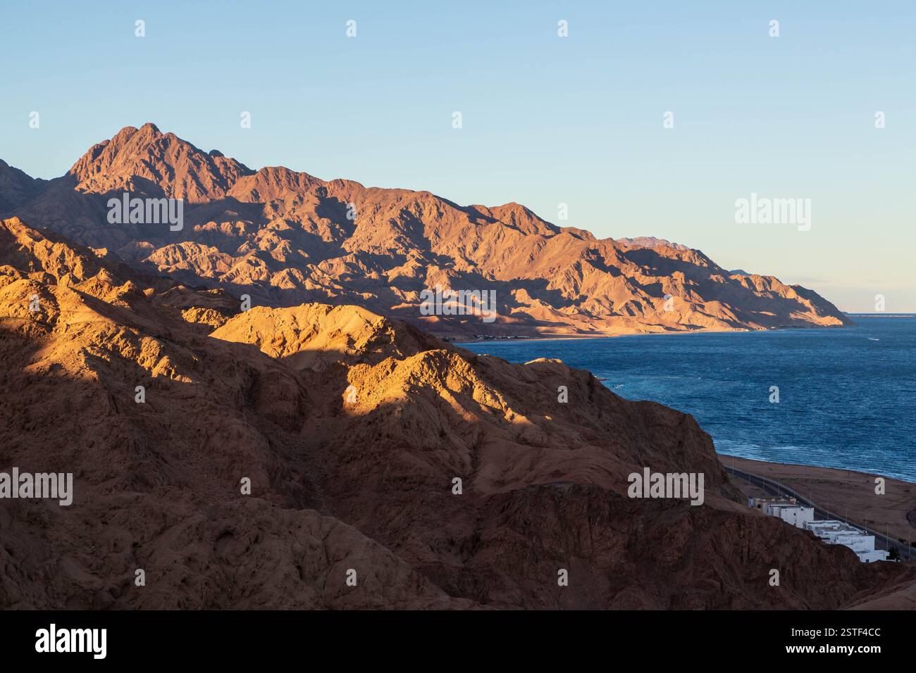Aerial view of Sinai mountains and Red Sea at sunset. Dahab town, Sinai ...