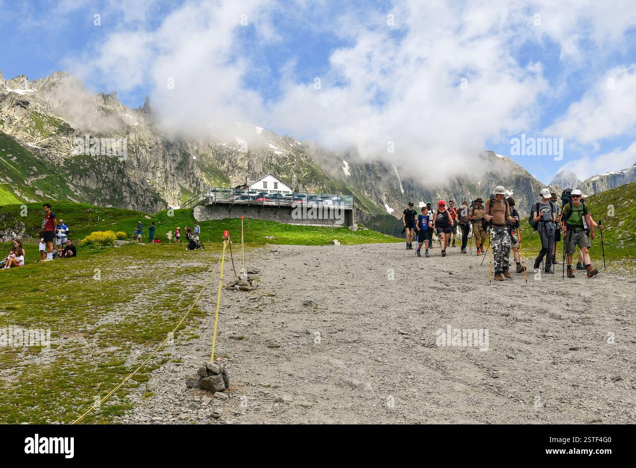 Groups of hikers at the Planpraz plateau (2000 m) in the Aiguilles ...