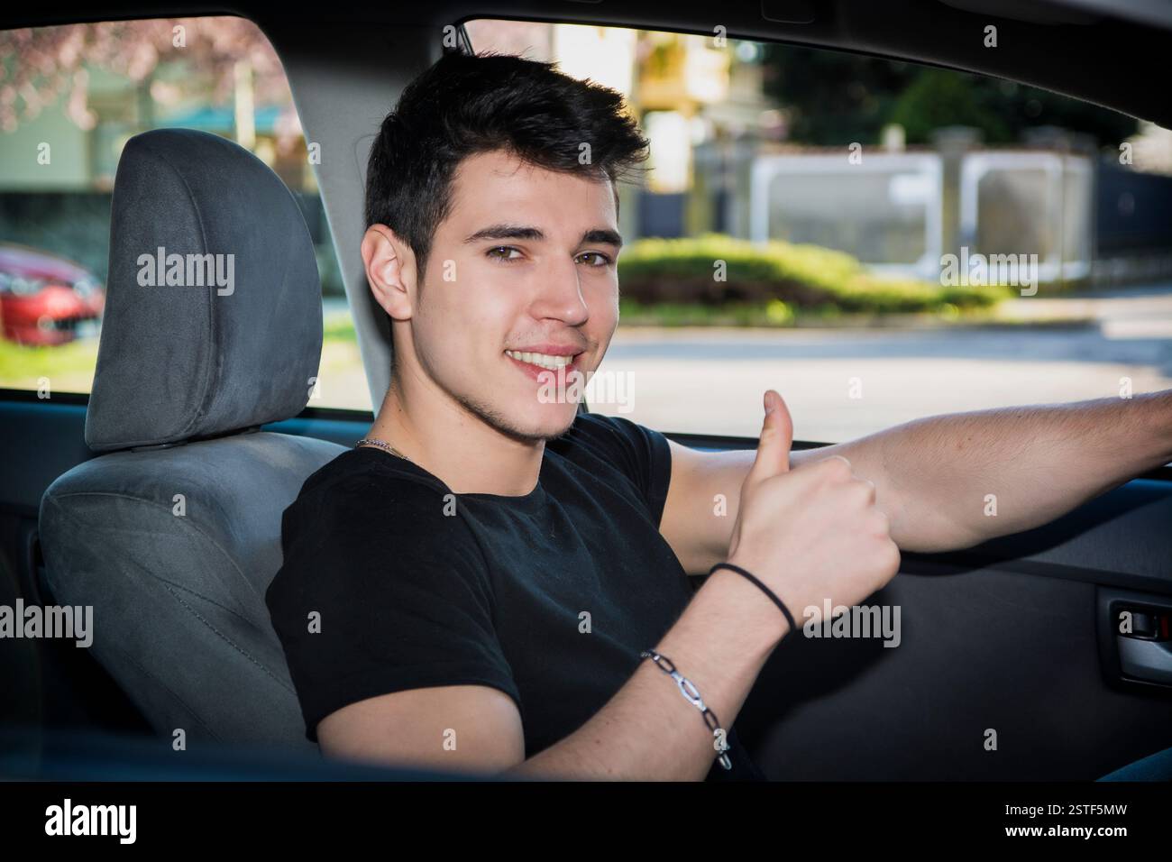 Young male happy proud hi-res stock photography and images - Alamy