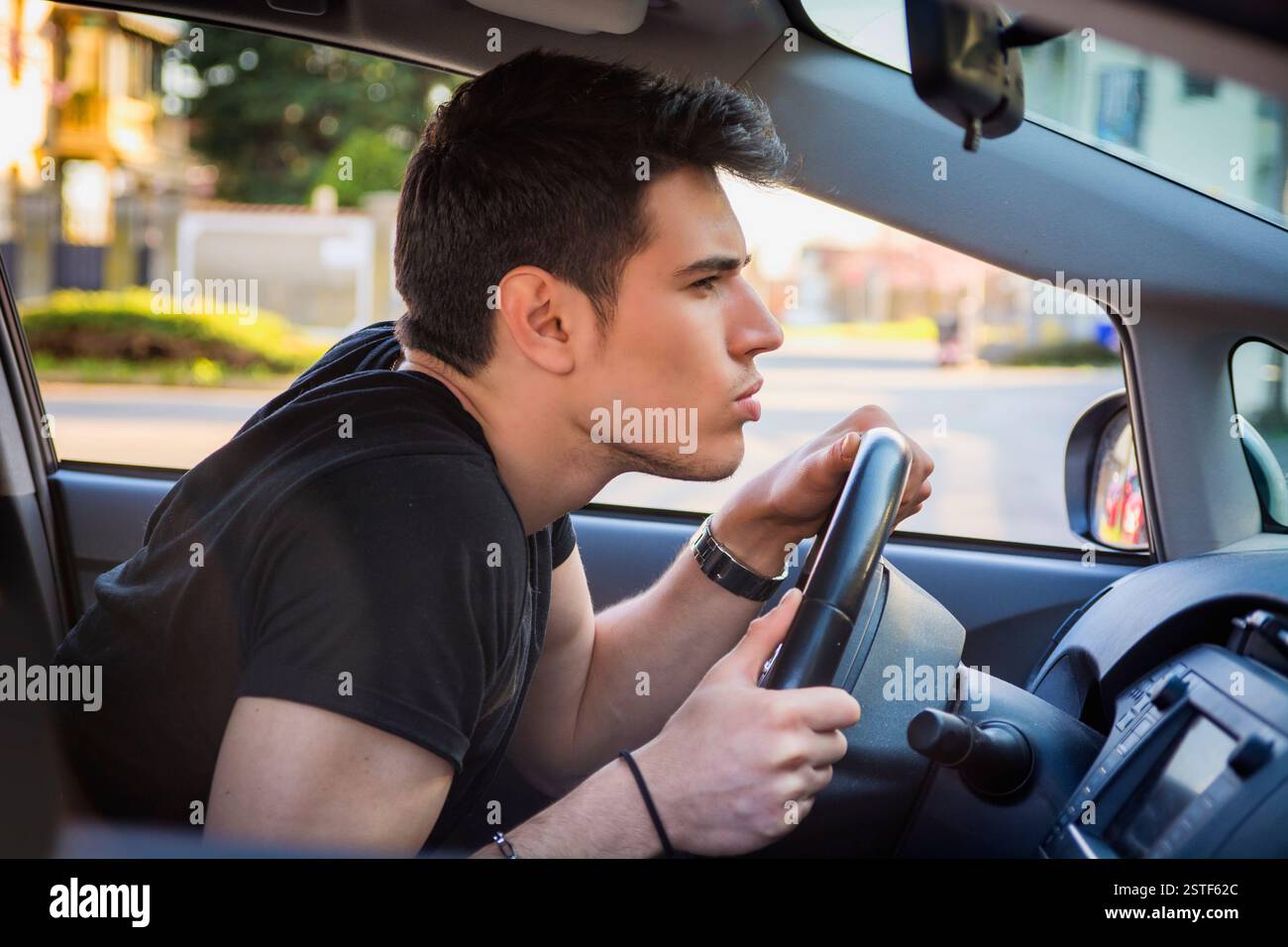Man clutching car hi-res stock photography and images - Alamy