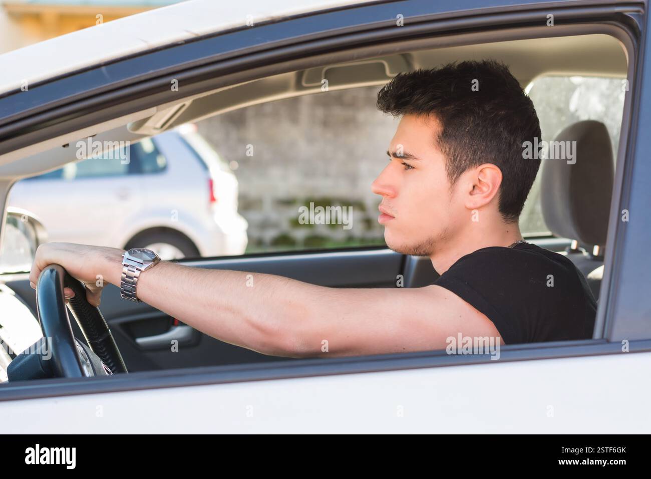 Male driving white car hi-res stock photography and images - Alamy