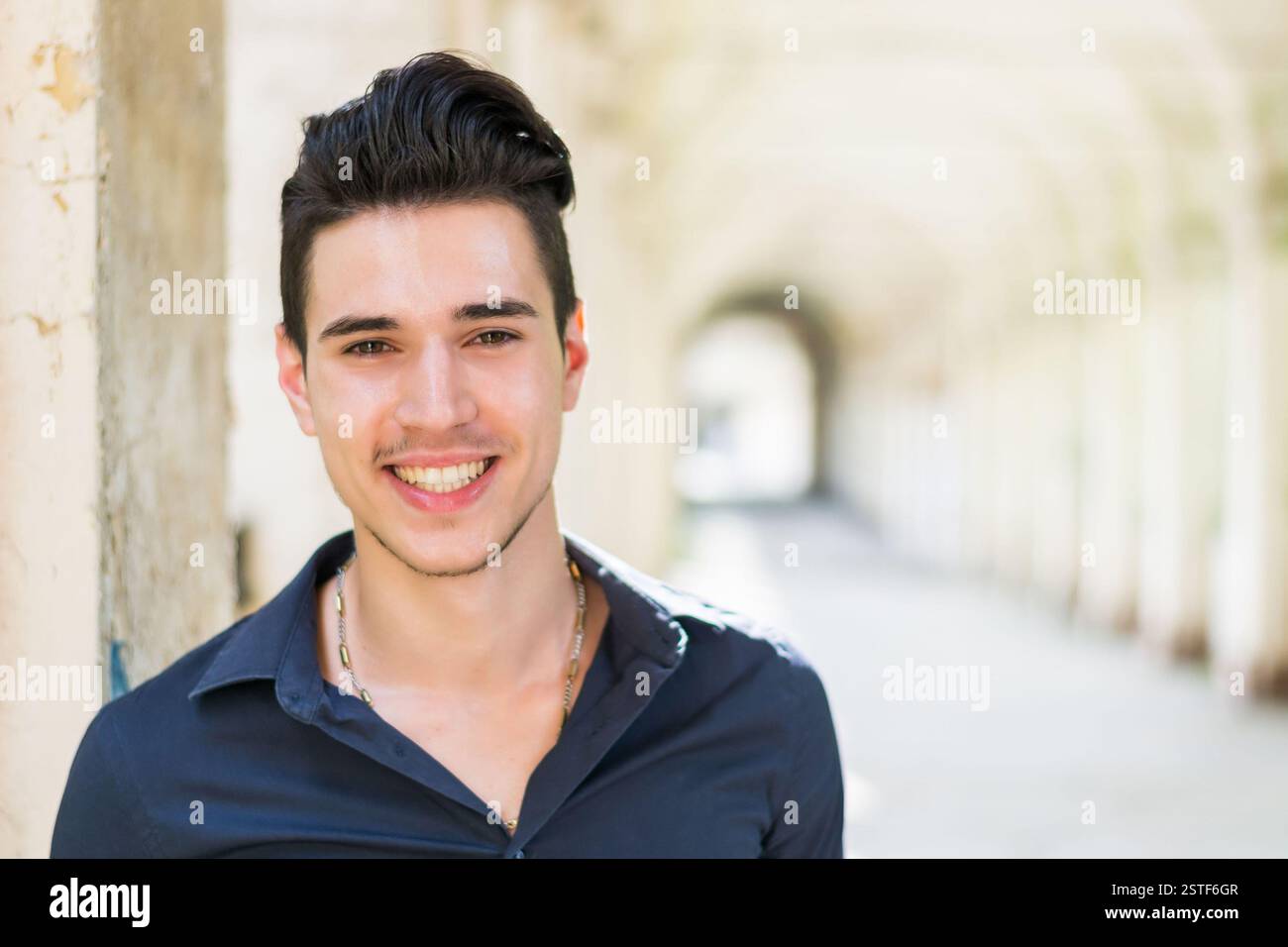 Handsome man smiling camera outside hi-res stock photography and images ...