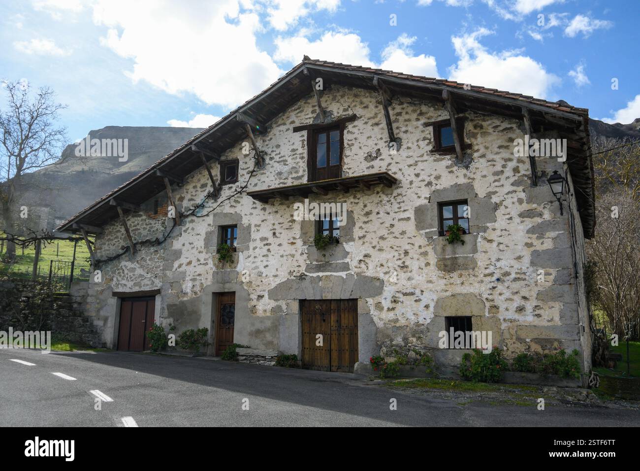Typical Basque farmhouse at the foot of the mountains Stock Photo - Alamy