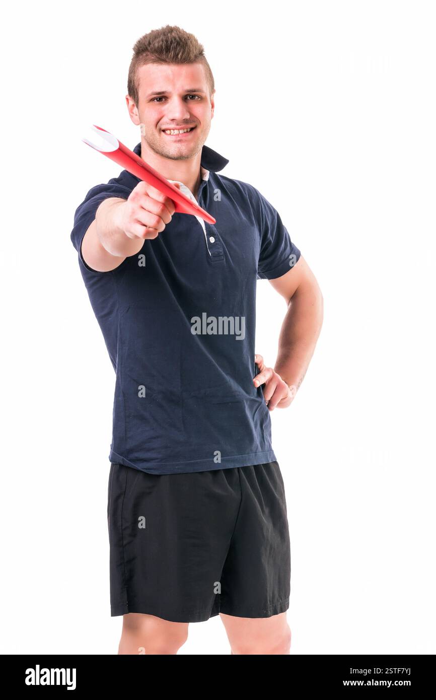 Handsome young personal trainer with clipboard, standing isolated on ...