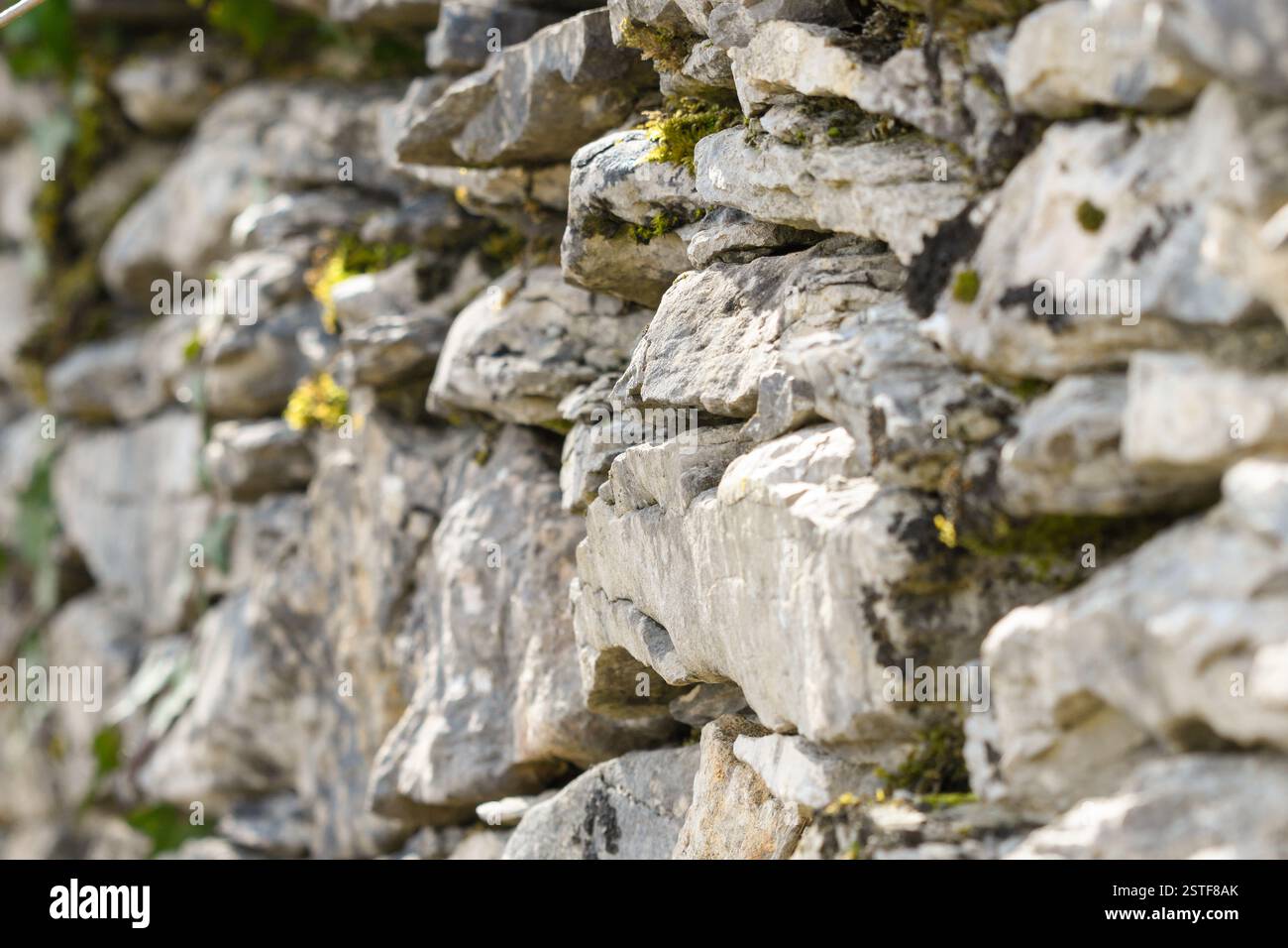 Ancient limestone wall Stock Photo - Alamy