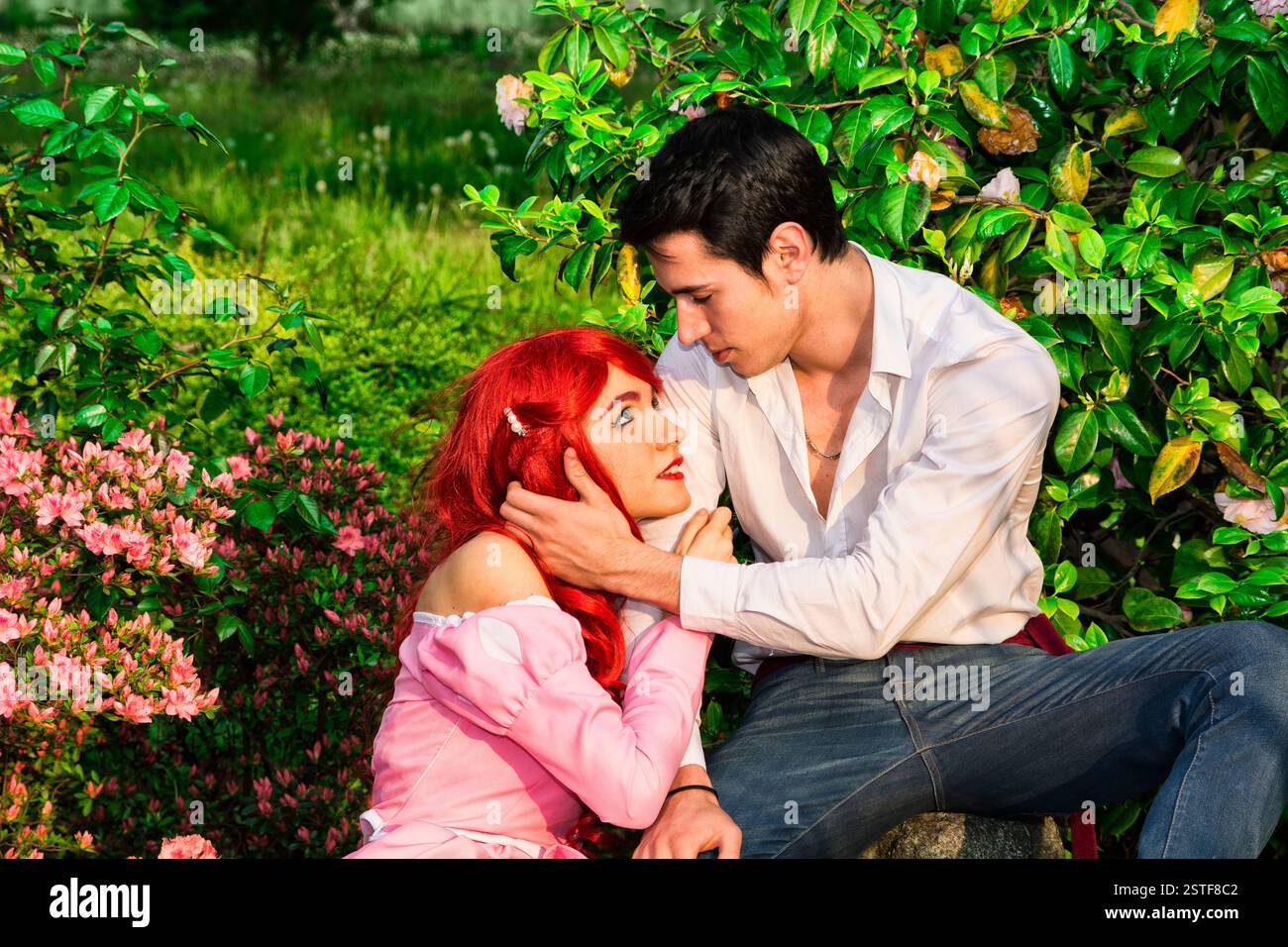 Romantic Fairy Tale Couple Sitting in Garden among Flowers in Peaceful ...