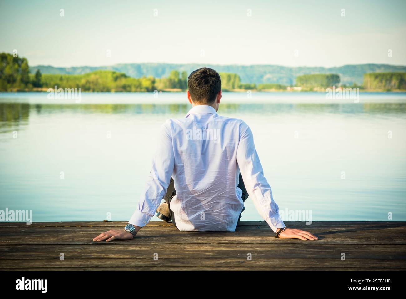 One handsome man meditating hi-res stock photography and images - Alamy
