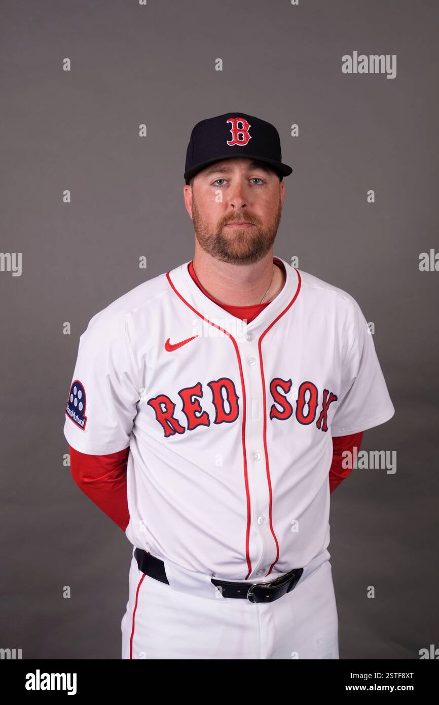 Boston Red Sox catching instructor/bullpen catcher Parker Guinn poses ...