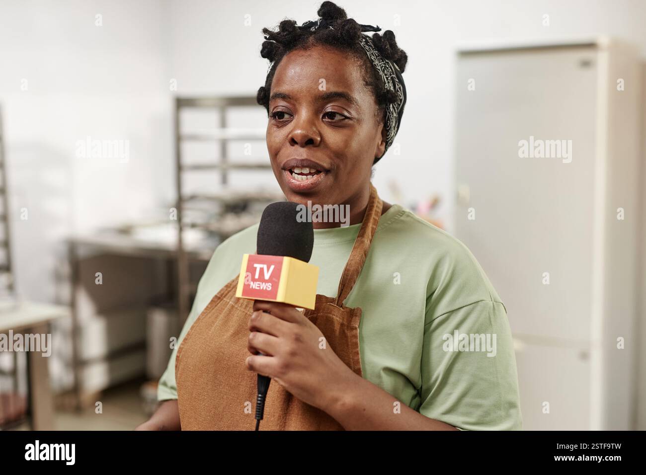 Female factory worker giving interview hi-res stock photography and ...