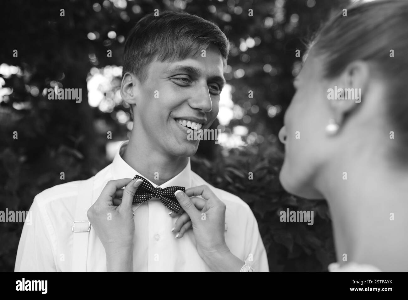 Bride walking groom in park hi-res stock photography and images - Alamy