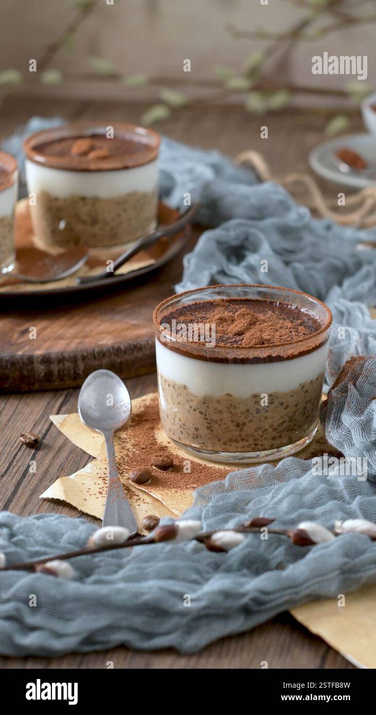 Two delicious tiramisu overnight oats in clear glass containers ...