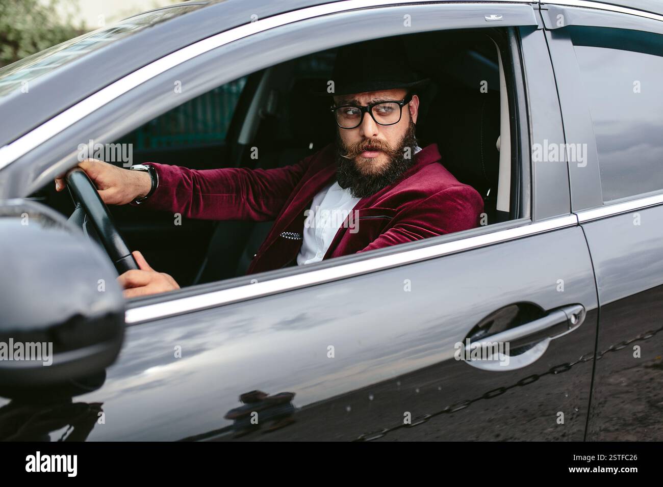 Man posing luxury car hi-res stock photography and images - Alamy