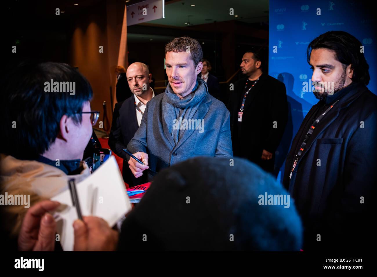 Berlin, Germany. 18th Feb, 2025. Benedict Cumberbatch (M), actor, signs ...