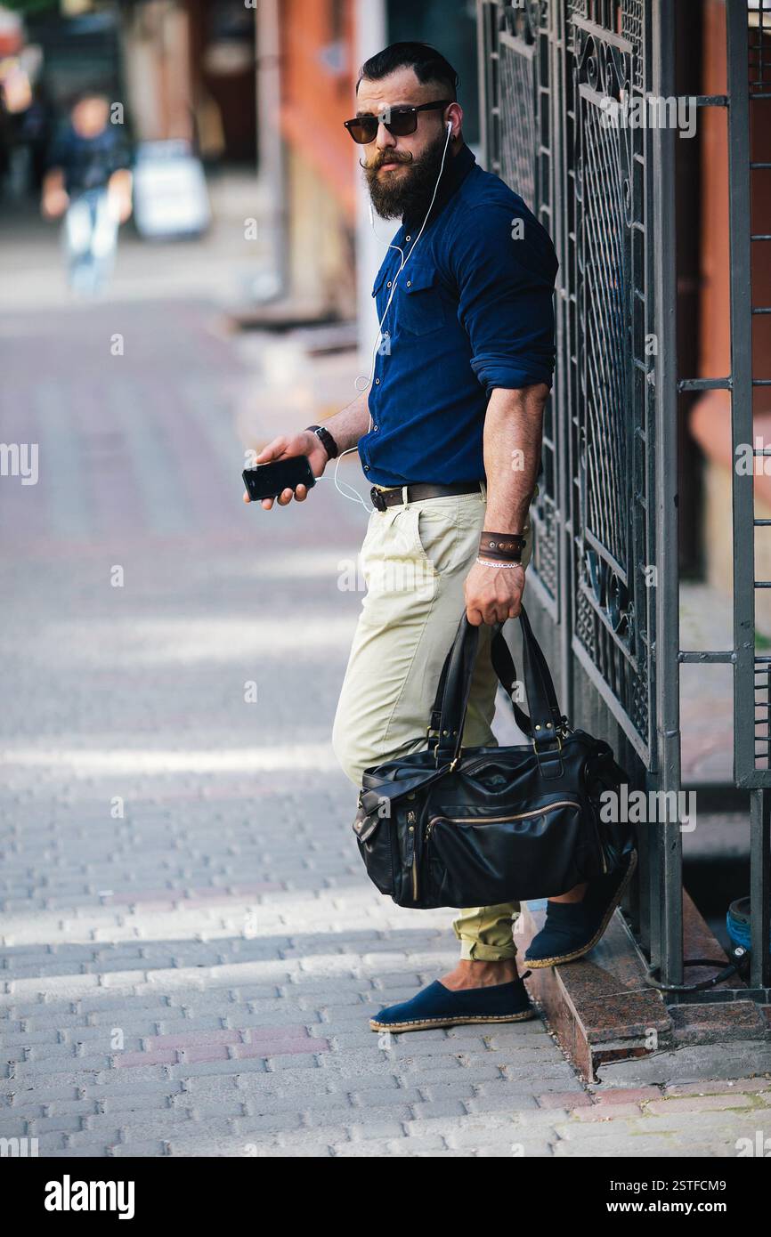 Bearded man standing against hi-res stock photography and images - Alamy
