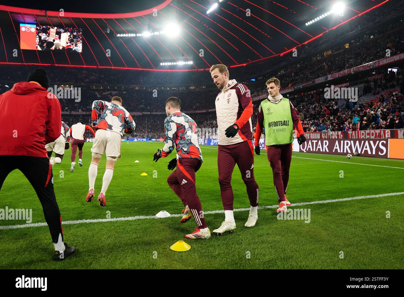 Bayern Munich's Harry Kane (second right) warms up ahead of the UEFA ...