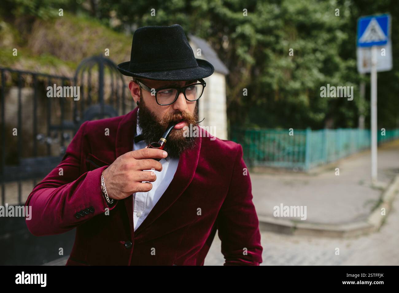 Rich man with a beard, thinking about business Stock Photo - Alamy