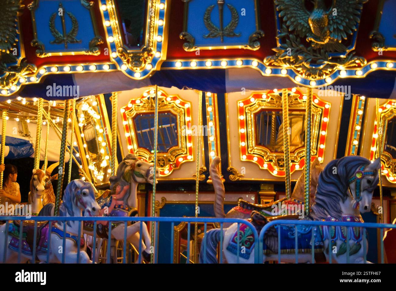 Boston is a carousel. Brightly lit with colorful lights and gold ...