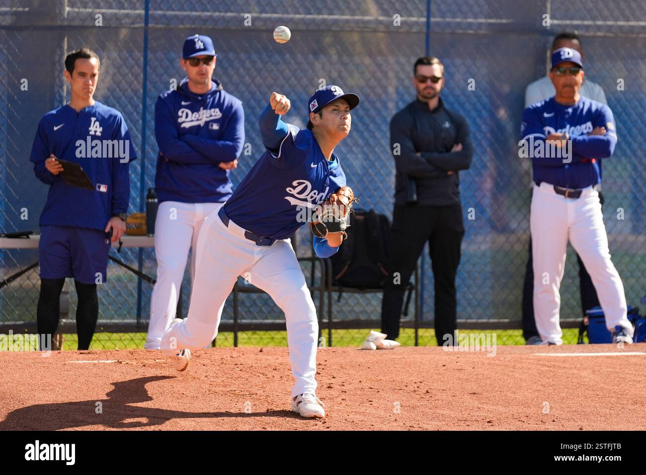 Los Angeles Dodgers two-way player Shohei Ohtani (17) throws in the ...