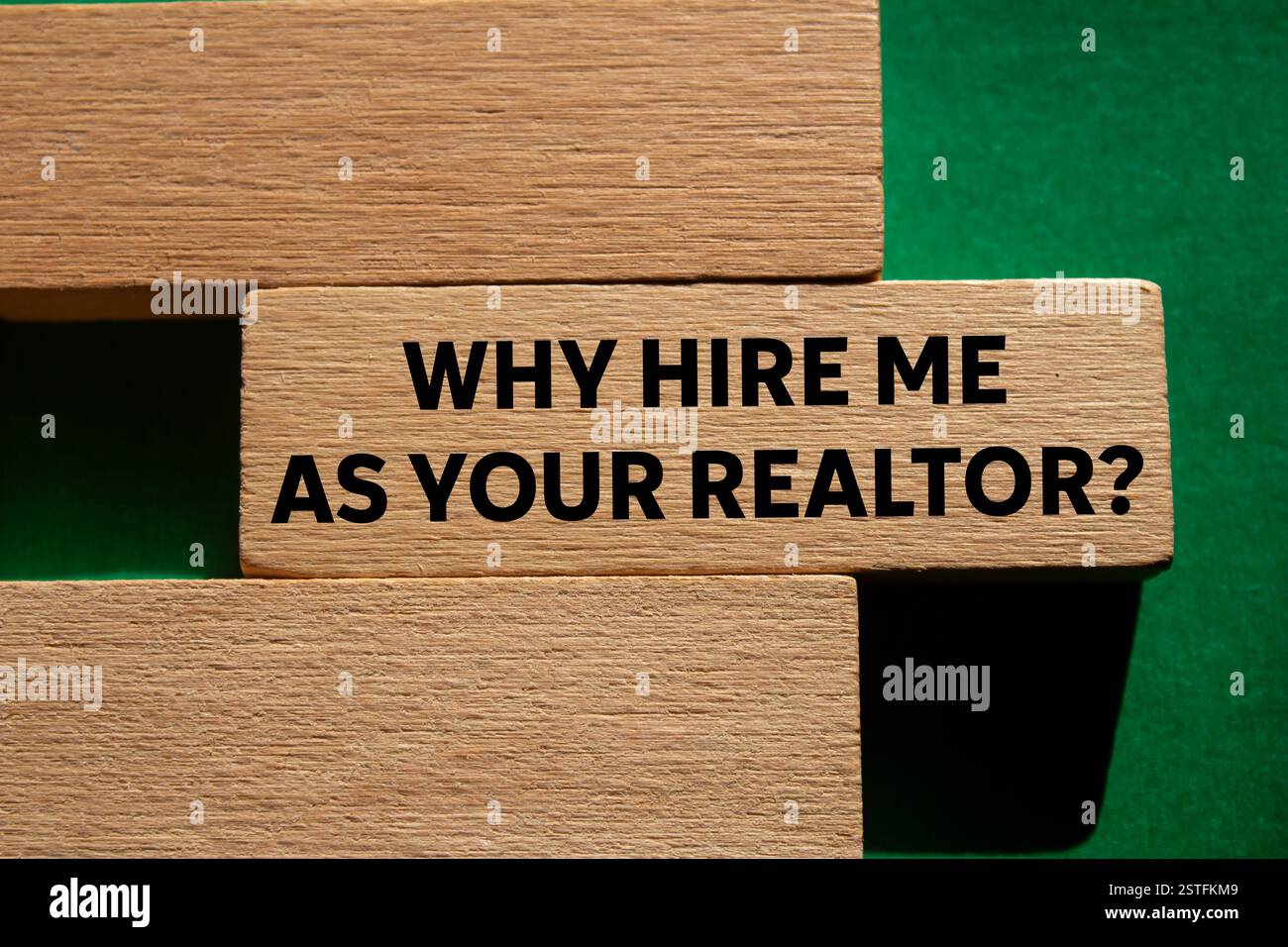 Why hire me as your realtor message written on wooden block on green ...