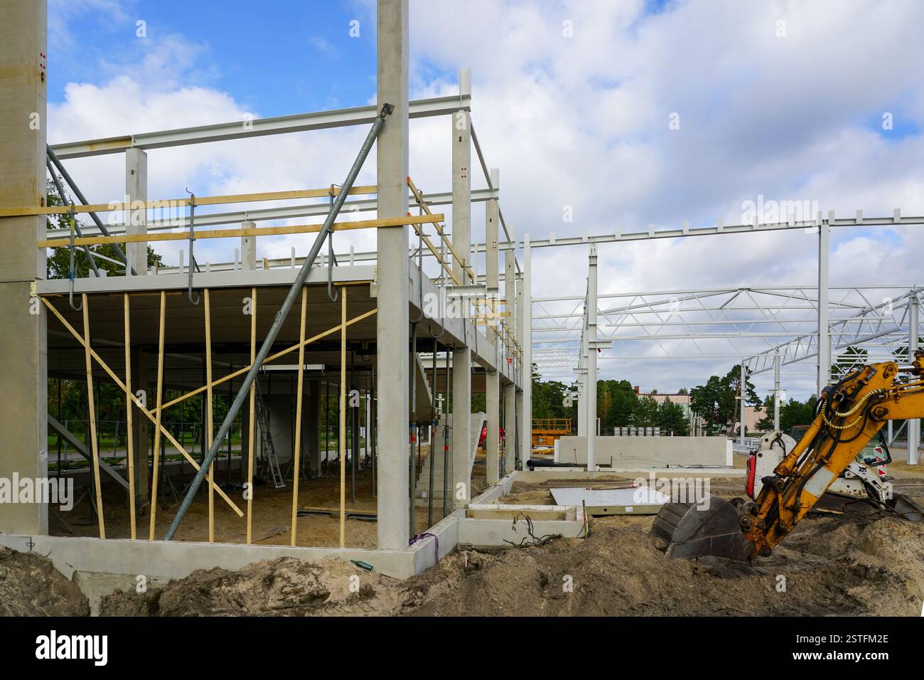Construction site of a new modern factory reinforced concrete and metal ...