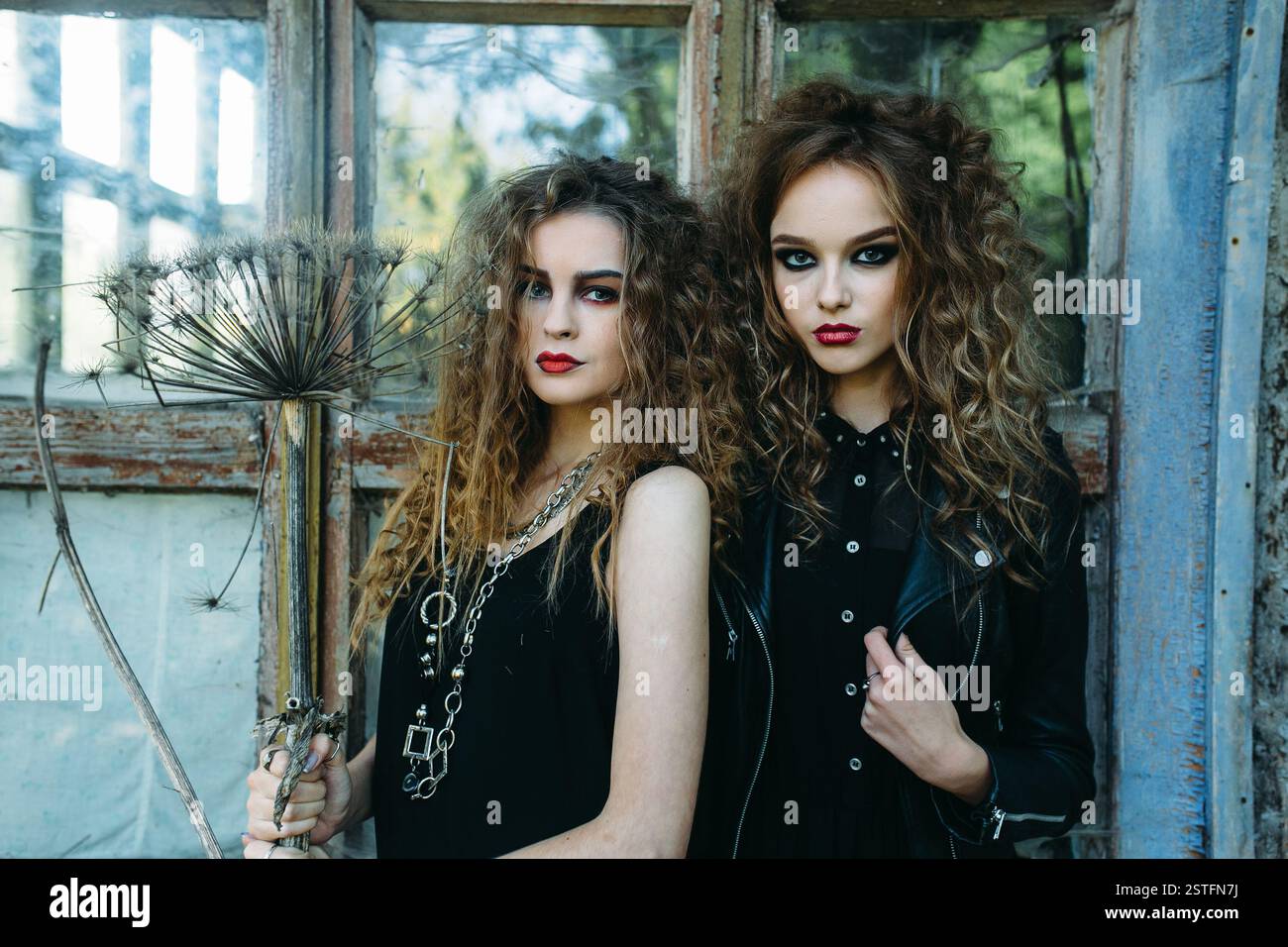 Two vintage women as witches Stock Photo - Alamy
